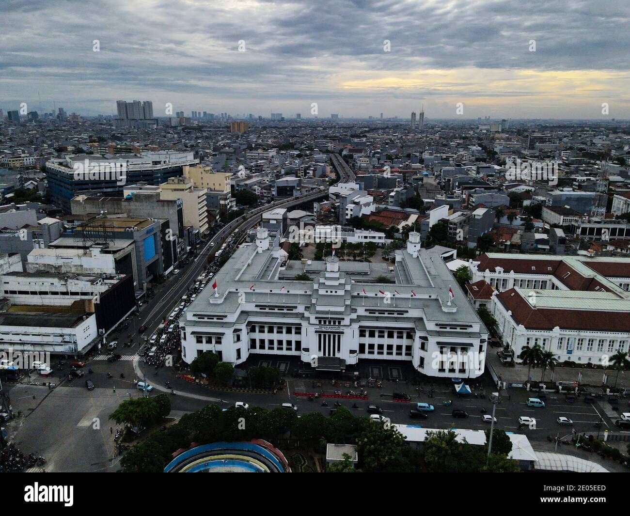Aerial view of the Mandiri Museum with Jakarta cityscape background ...