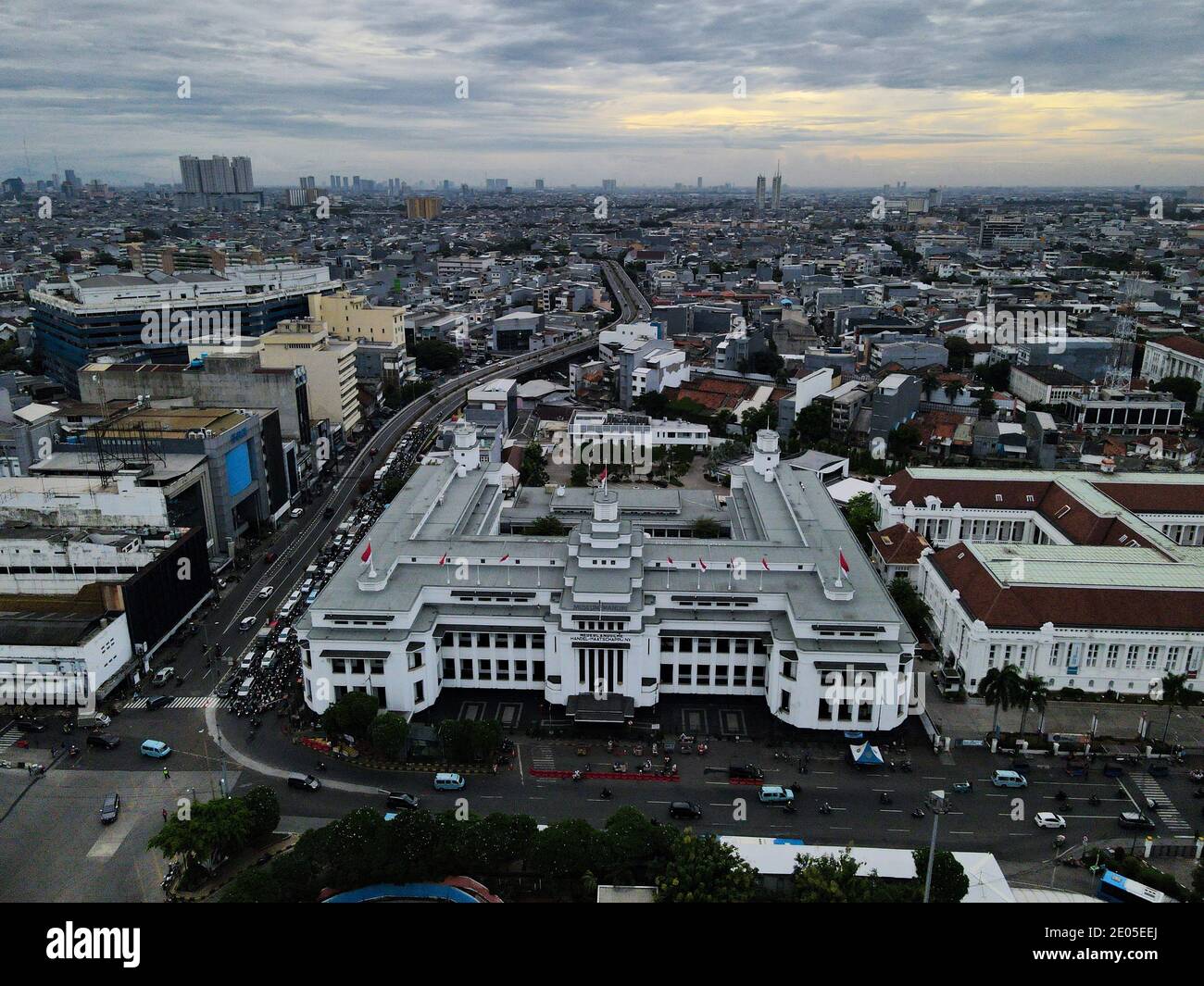 Aerial view of the Mandiri Museum with Jakarta cityscape background ...