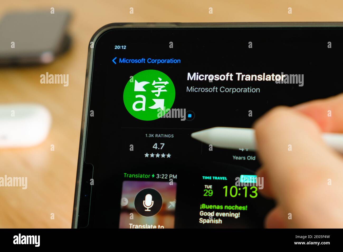 Microsoft Translator logo shown by apple pencil on the iPad Pro tablet ...