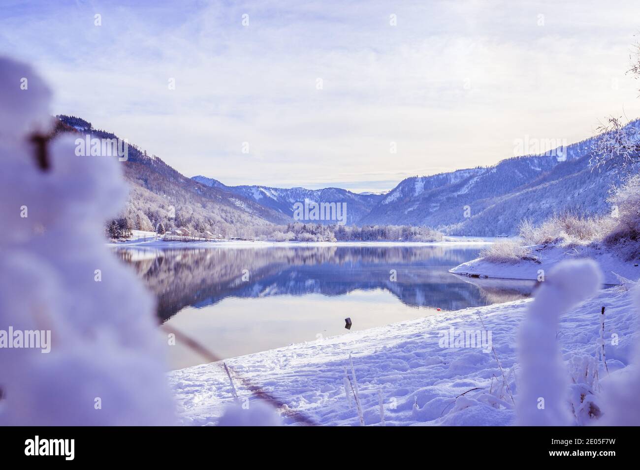Idyllic winter landscape: Reflection lake, snowy trees and mountains ...