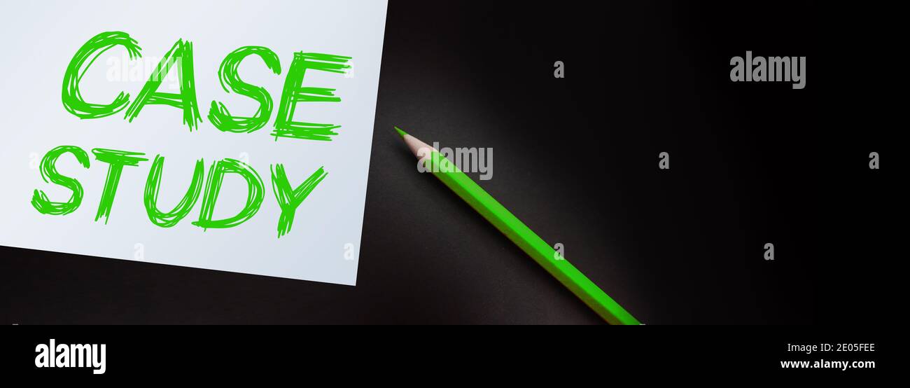 Hand drawing Case study words on white piece of paper with orange ...