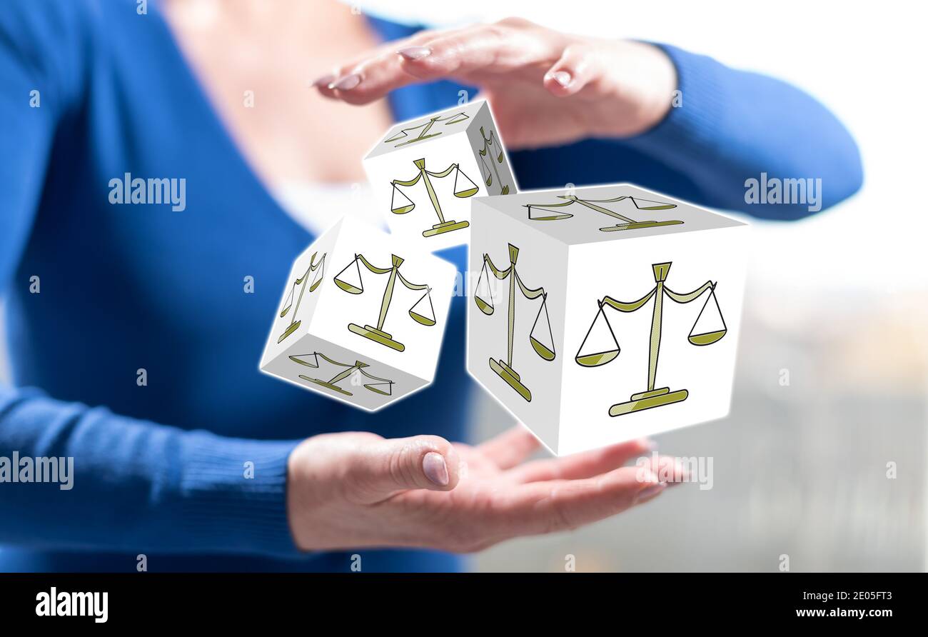 Scales of justice in hands hi-res stock photography and images - Alamy