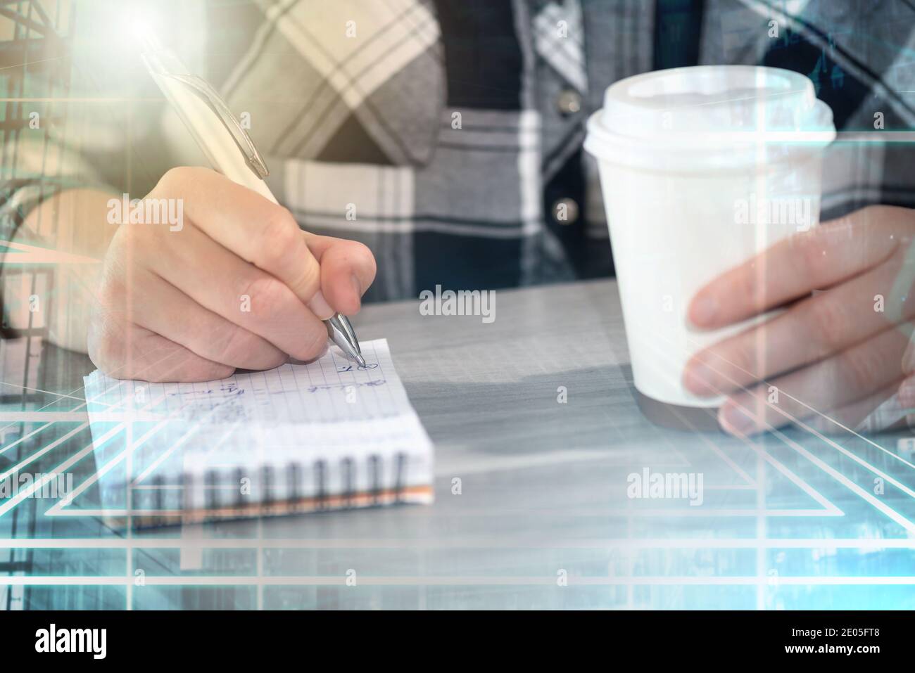 Female hands taking notes on notepad; multiple exposure Stock Photo - Alamy