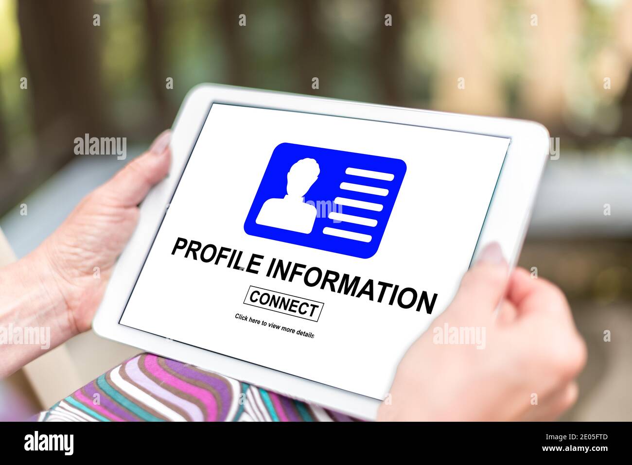 Female hands holding a tablet with profile information concept Stock ...