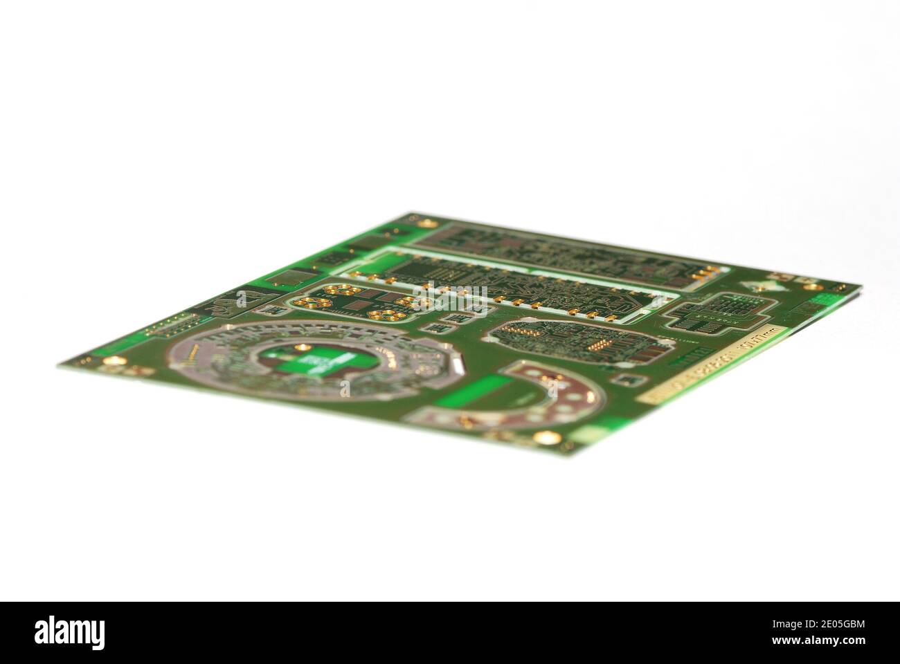 large circuit board with small electric components on white background ...
