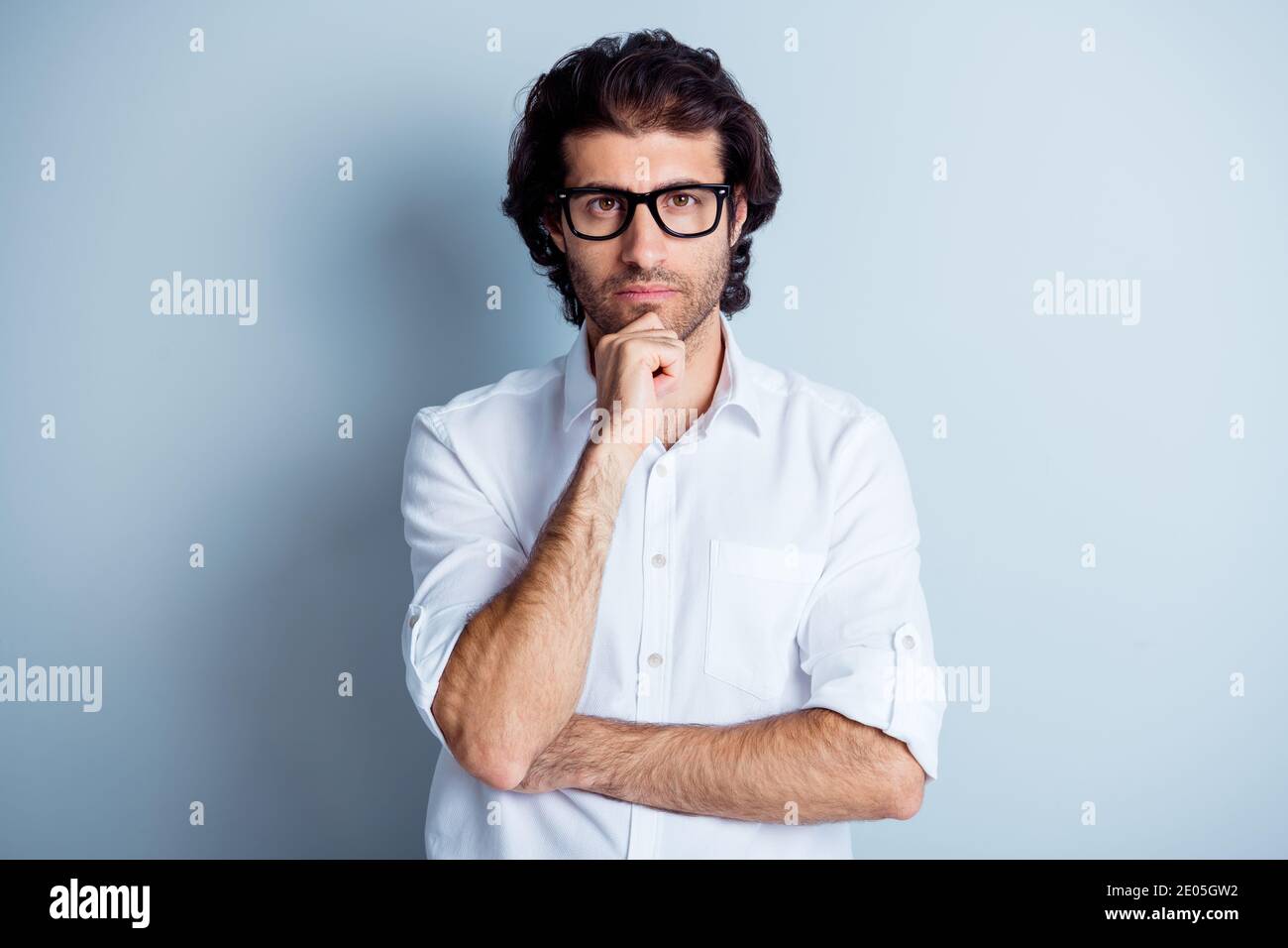 Photo portrait of genius man touching face chin with finger ...