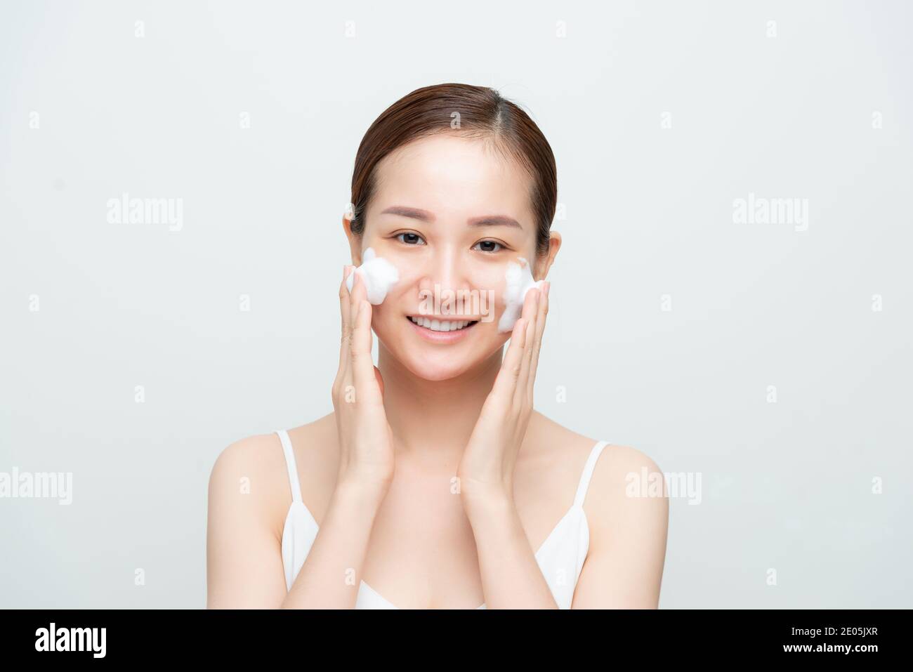 Asian woman washing a face Stock Photo - Alamy
