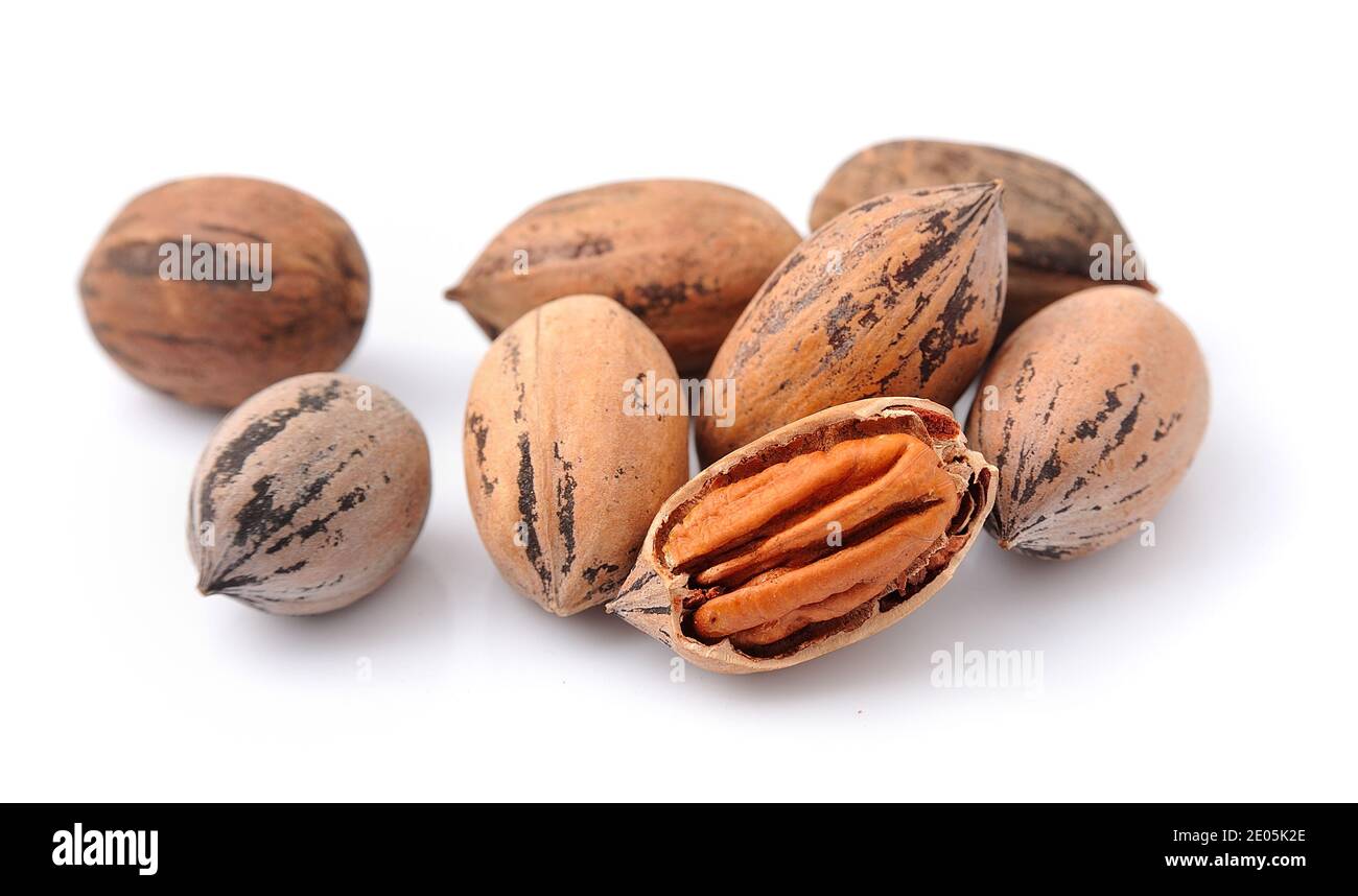 Pecan nuts close up on white background Stock Photo - Alamy