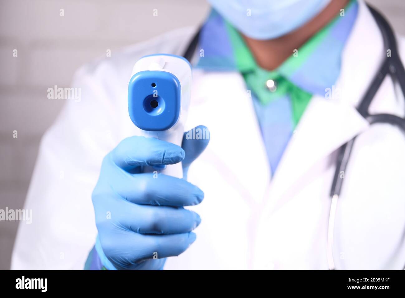 doctor hand with thermometer check temperature Stock Photo - Alamy