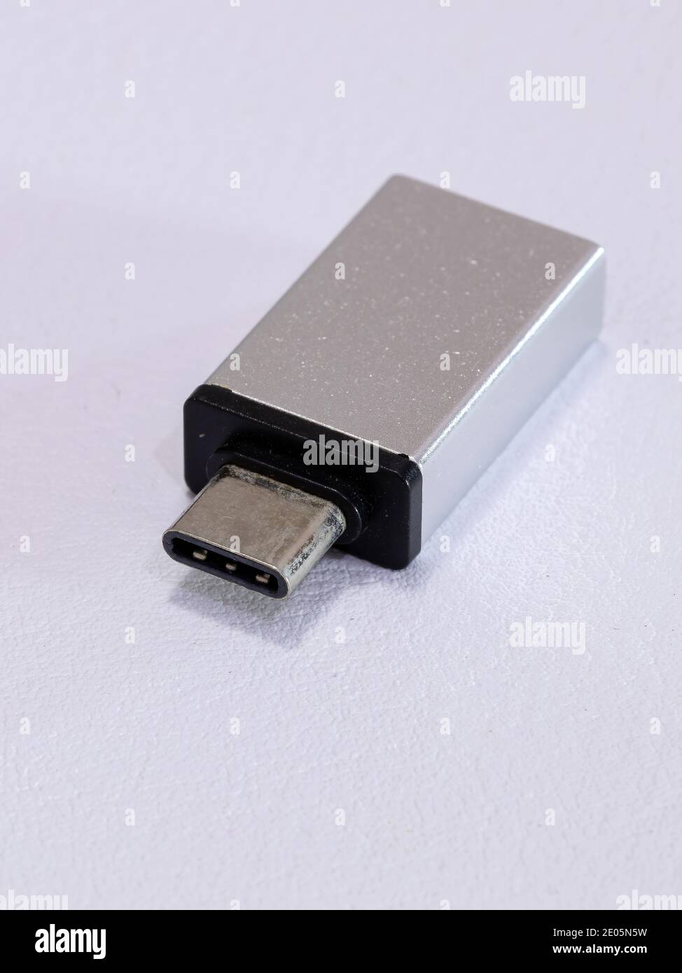Small OTG adapter to use USB devices via a cell phone's micro usb Stock ...