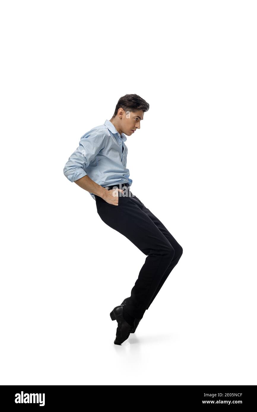 Dance king. Happy young man dancing in casual clothes or suit, remaking ...