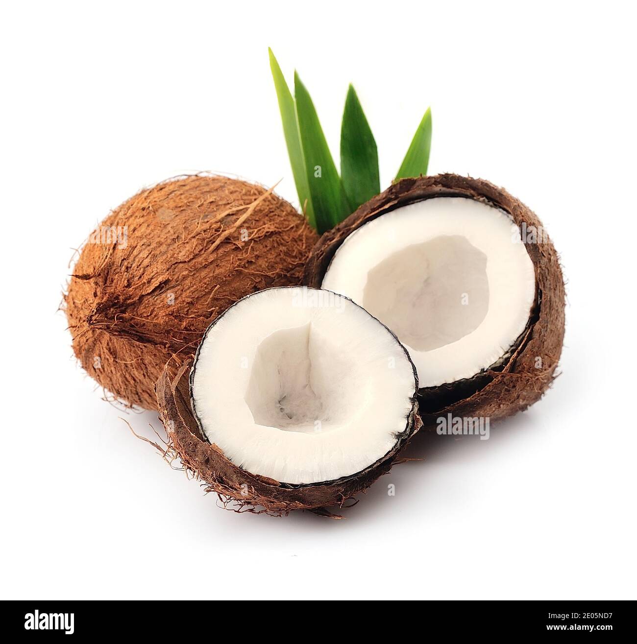 Coconuts with leaves on a white background Stock Photo - Alamy