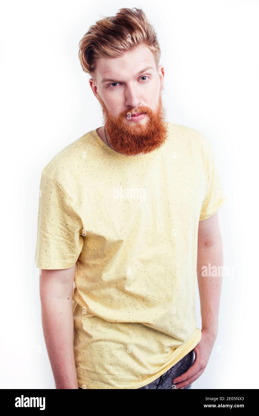 young handsome hipster ginger bearded guy looking brutal isolated on ...