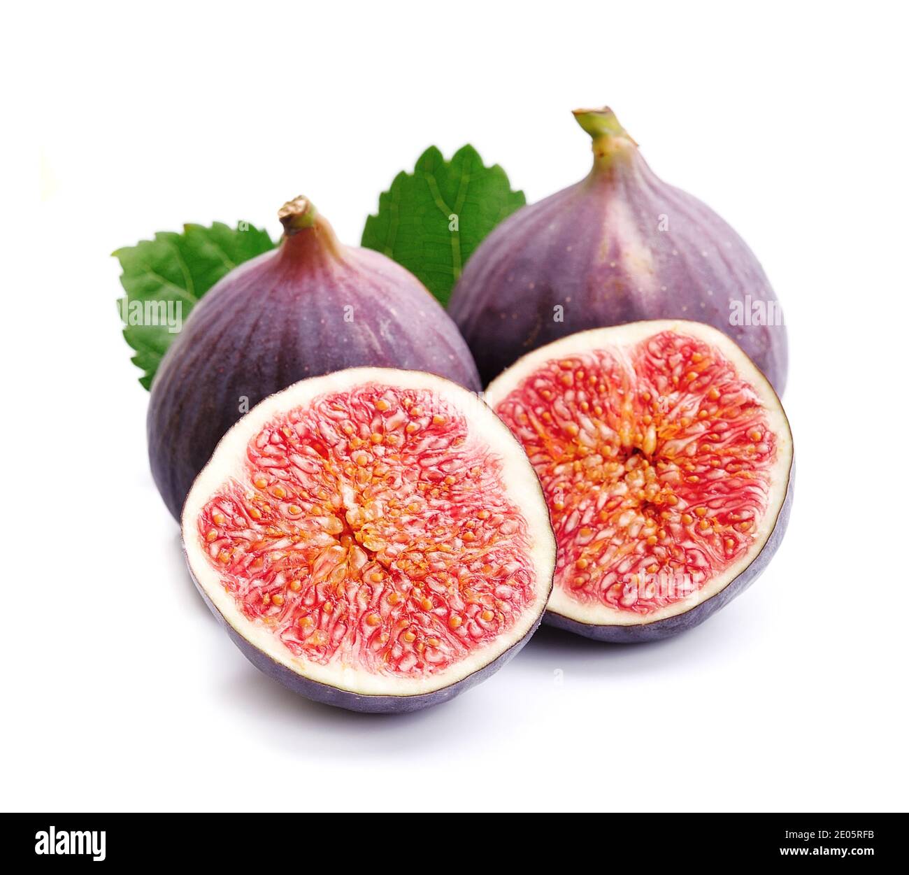 Fresh figs with leaves closeup on white backgrounds Stock Photo - Alamy