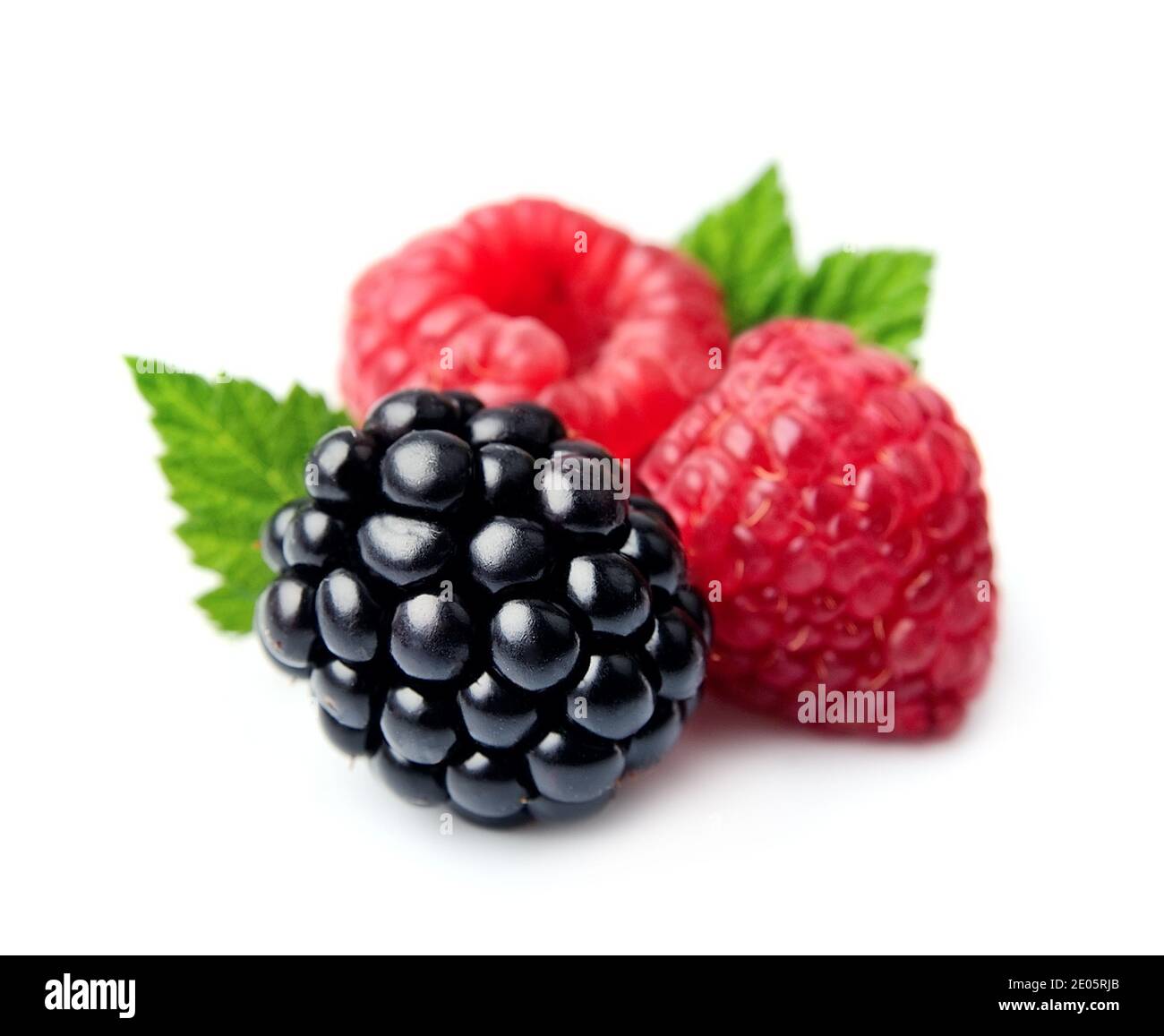 Sweet berries mix isolated on white background. Ripe raspberry and ...