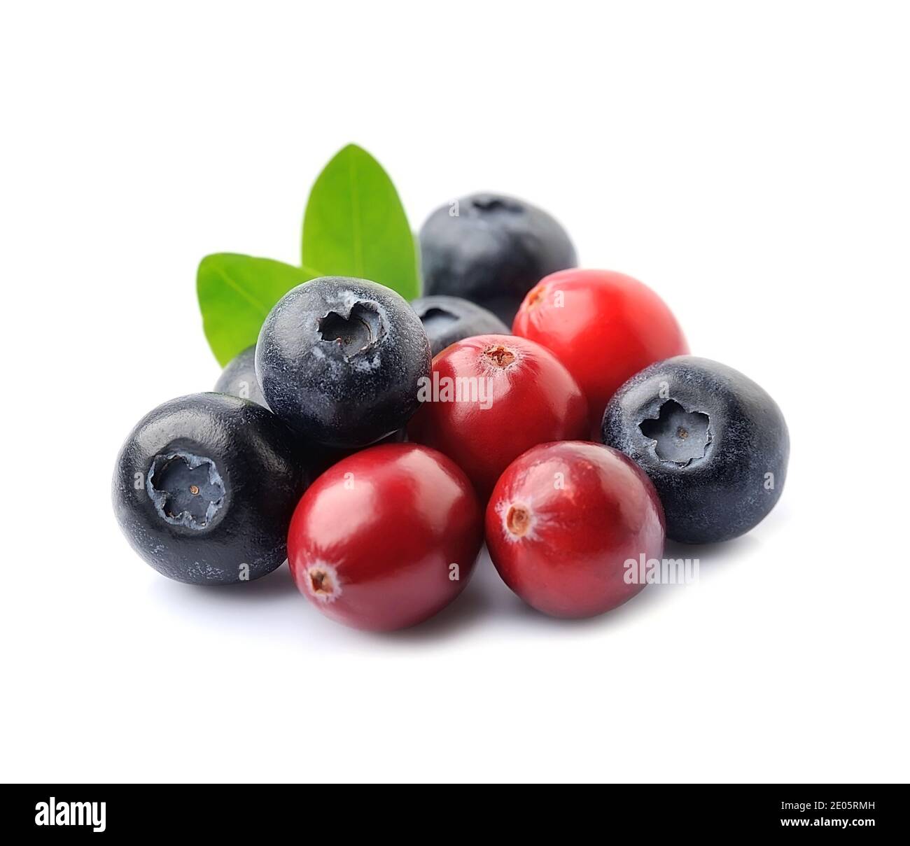 Sweet blueberries and cranberries isolated on white backgrounds. Mix of ...