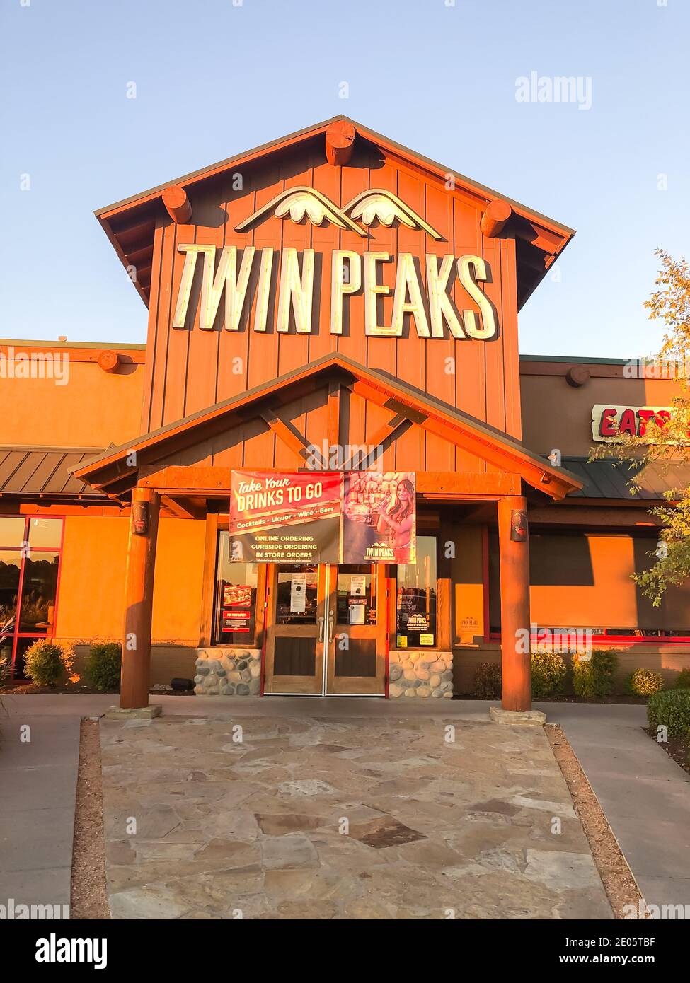 IRVING, TX, USA-DEC 6, 2020: Entrance to Twin Peaks restaurant chain at ... IRVING, TX, USA-DEC 6, 2020: Entrance to Twin Peaks restaurant chain at ...