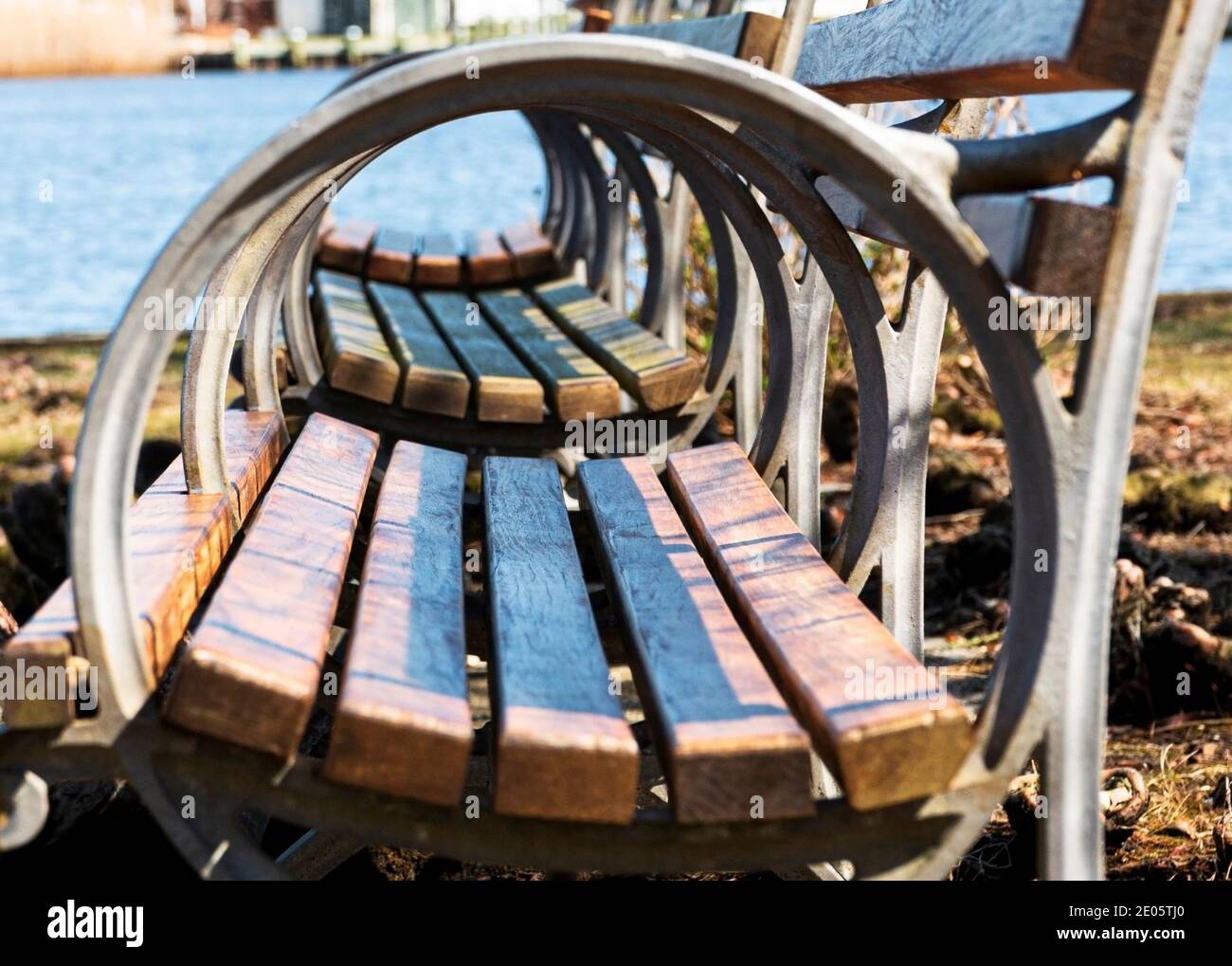 Wooden bench with arm rests hi-res stock photography and images - Alamy