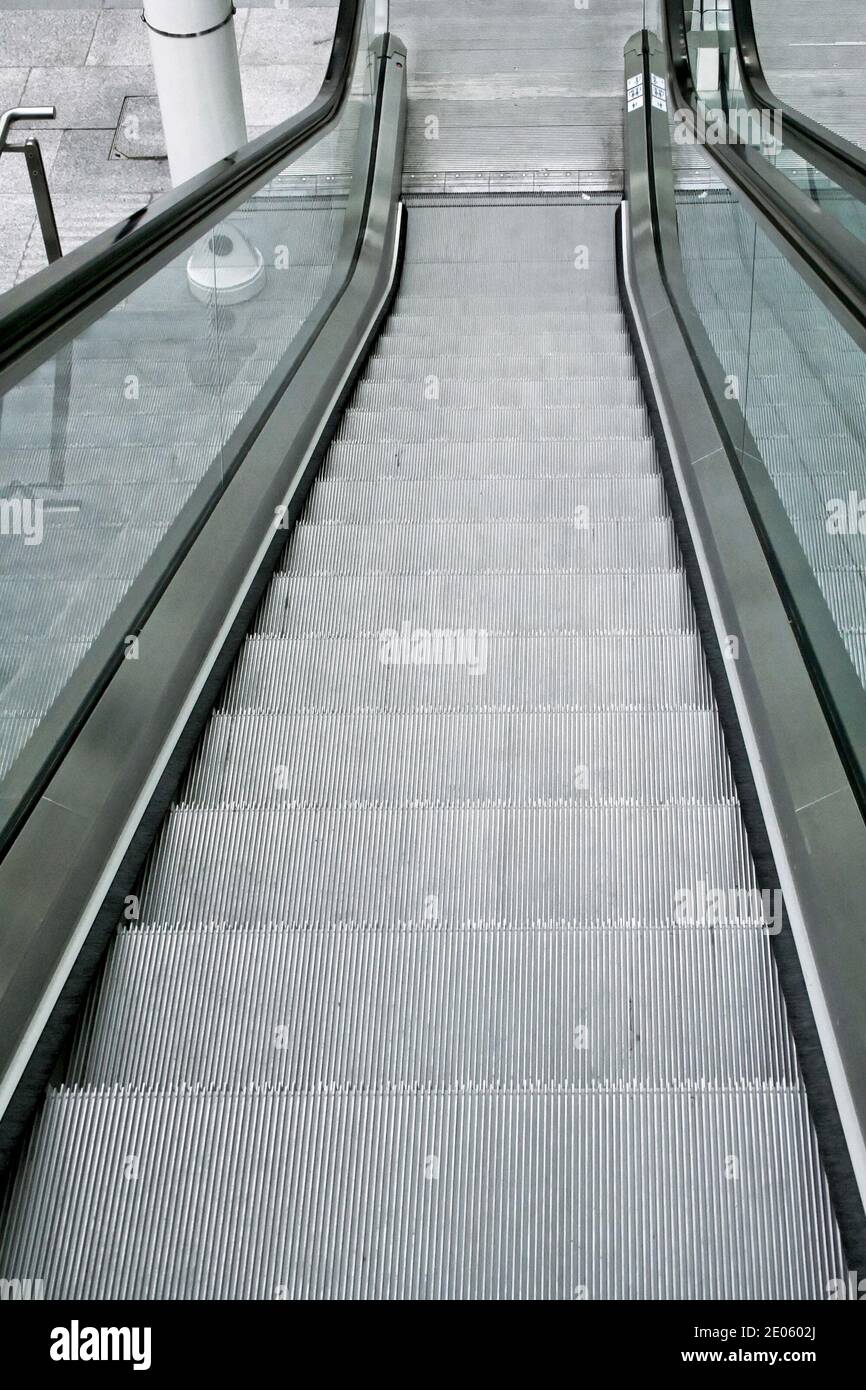 Shot of automatic escalator from above view Stock Photo - Alamy