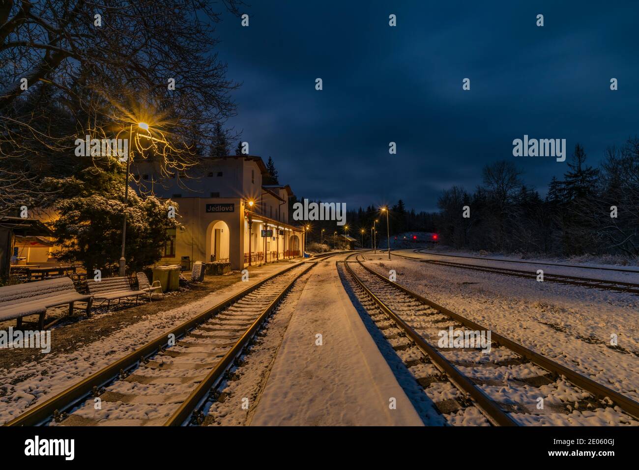 Winter snowy railway station Jedlova in the middle of Luzicke hory in ...