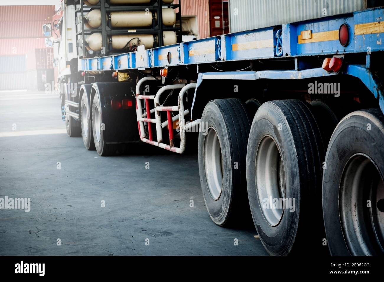 Transport view with import and export trucks Stock Photo - Alamy