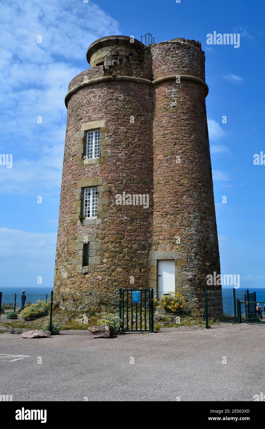France, old lighthouse and observation tower from 17. century on Cape Frehel on English Channel ...