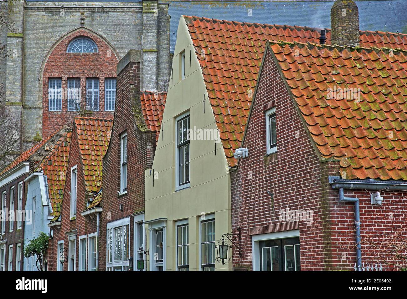 A row of traditional medieval houses, with the external facade of Grote ...