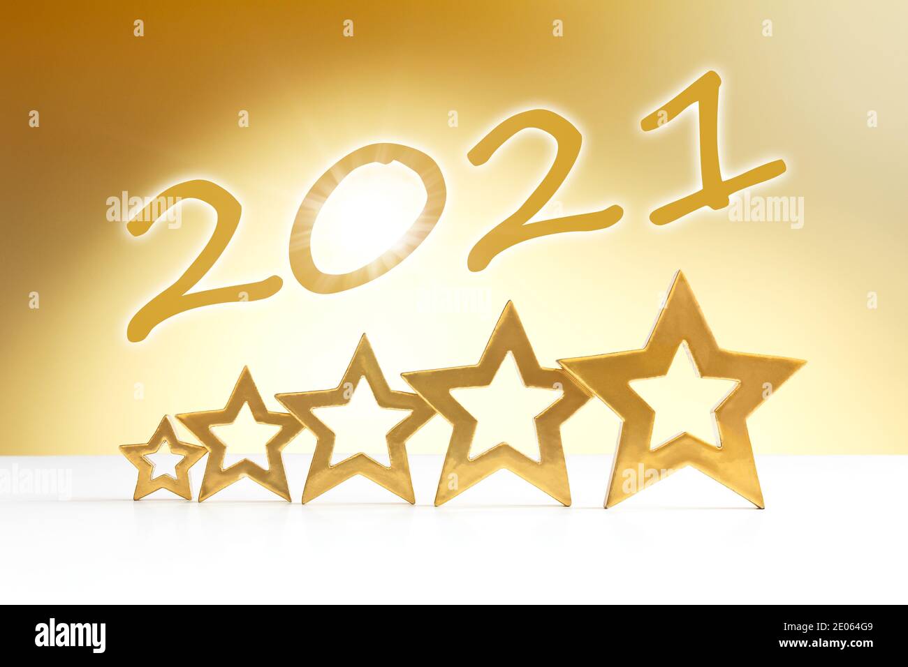 Better New Year concept. Golden 2021 text on a sparkling background ...