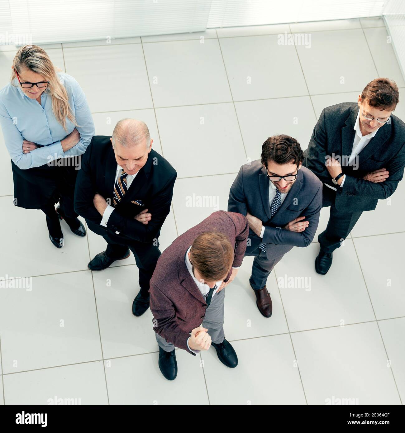 top view. leader and a group of employees standing together Stock Photo ...