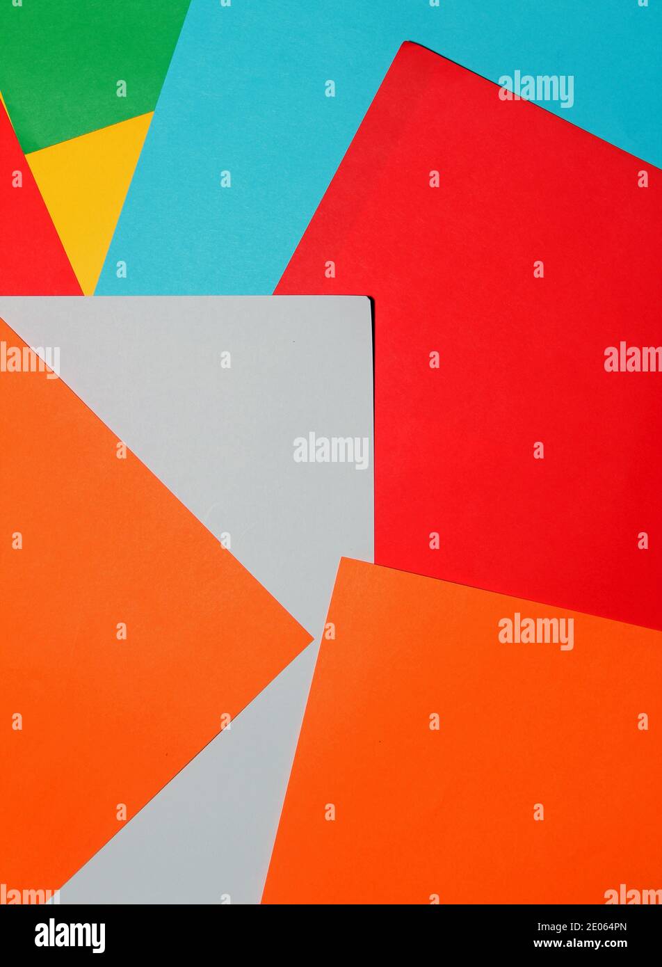 Sheets of multi coloured card/paper abstract background or backdrop ...