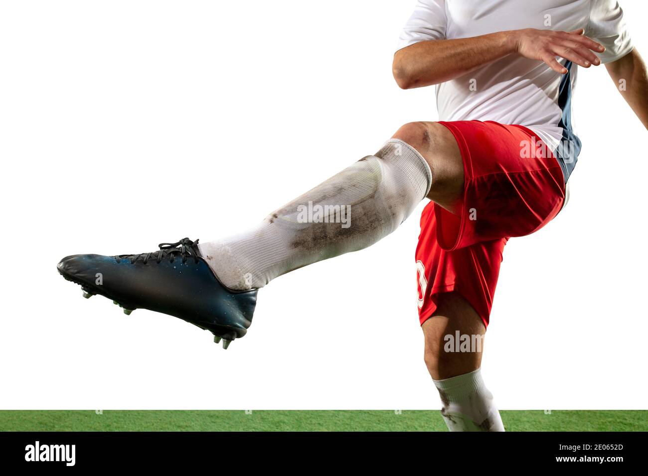 Leader. Close up legs of professional soccer, football player fighting ...