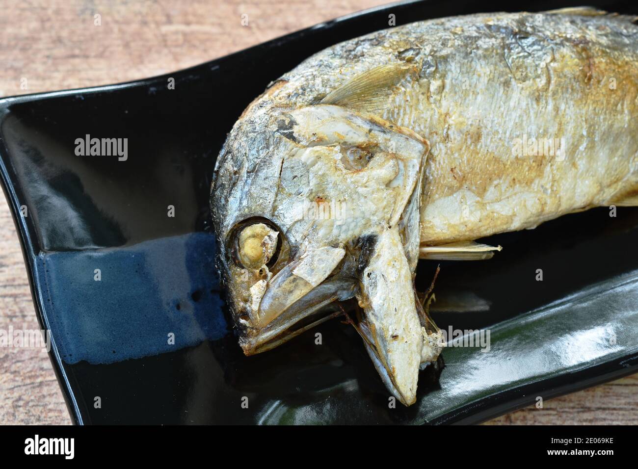Fried saba fish sauce hi-res stock photography and images - Alamy