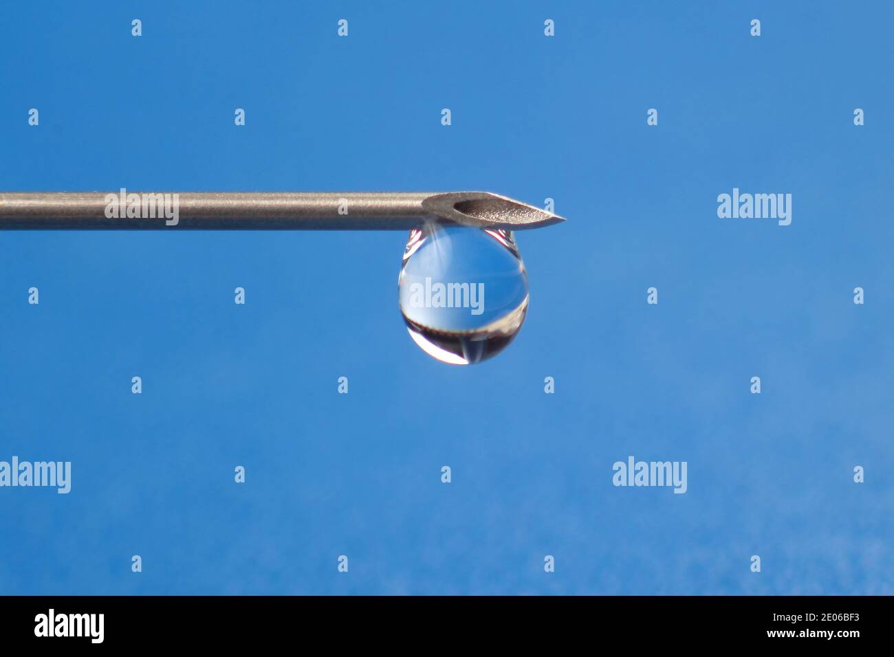 drop of liquid at the end of the needle for medical injections Stock ...