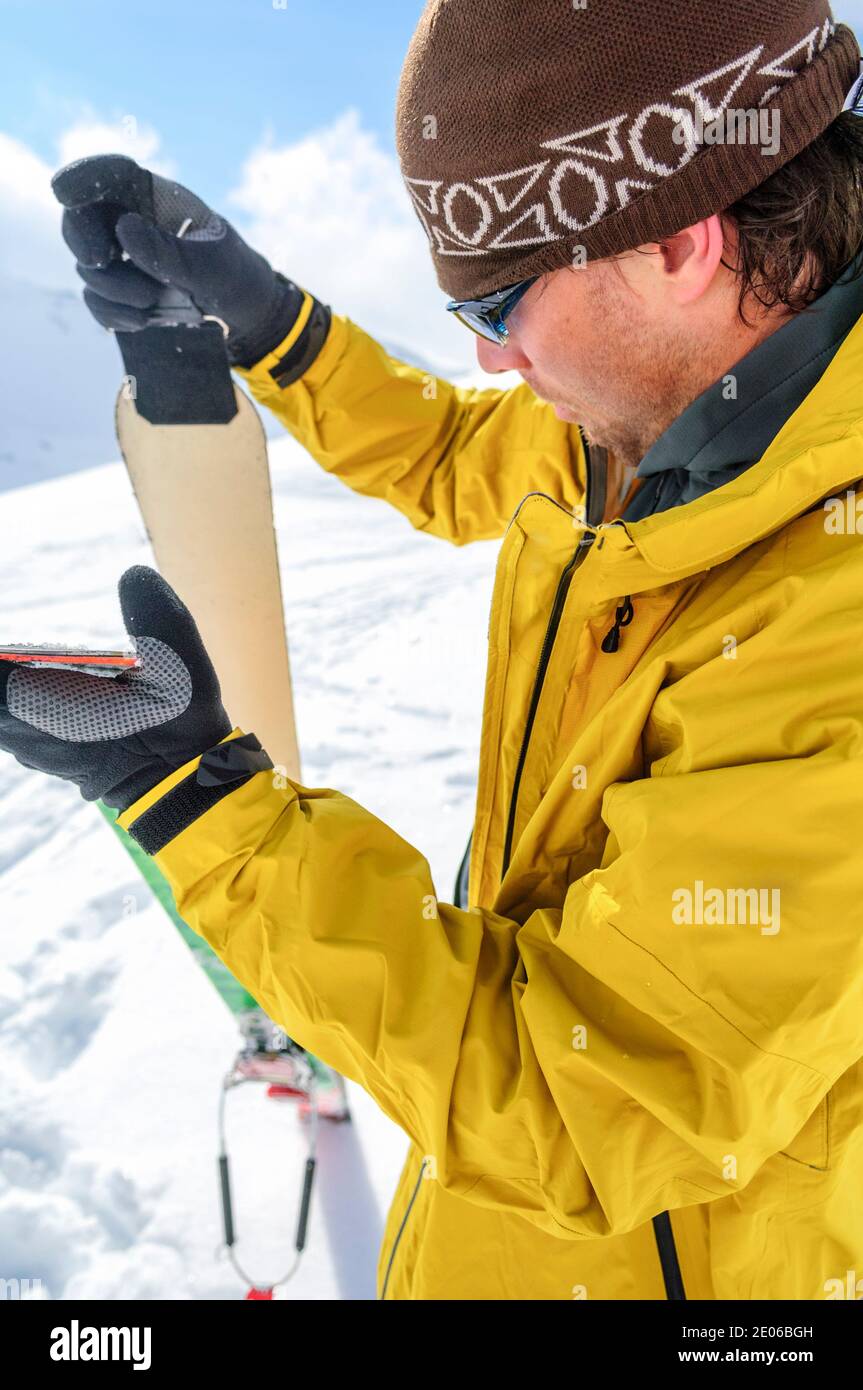 Preparing for a ski-tour in high alpine region Stock Photo - Alamy
