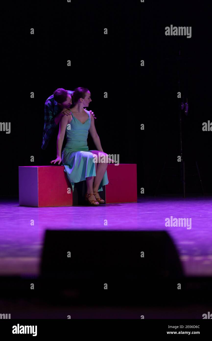dancers a man and a woman perform in a theater on stage in a dance ...