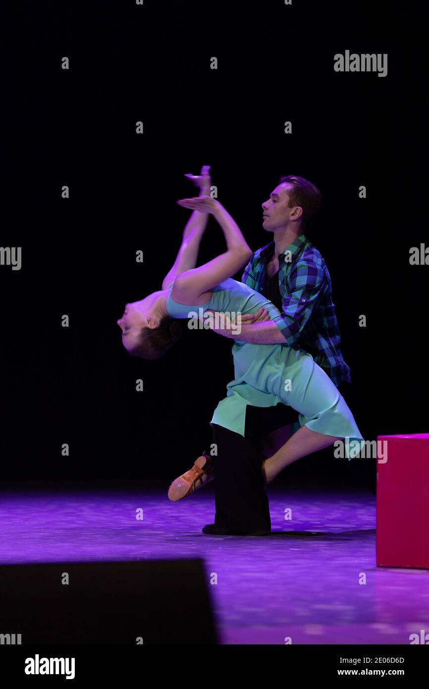 dancers a man and a woman perform in a theater on stage in a dance ...