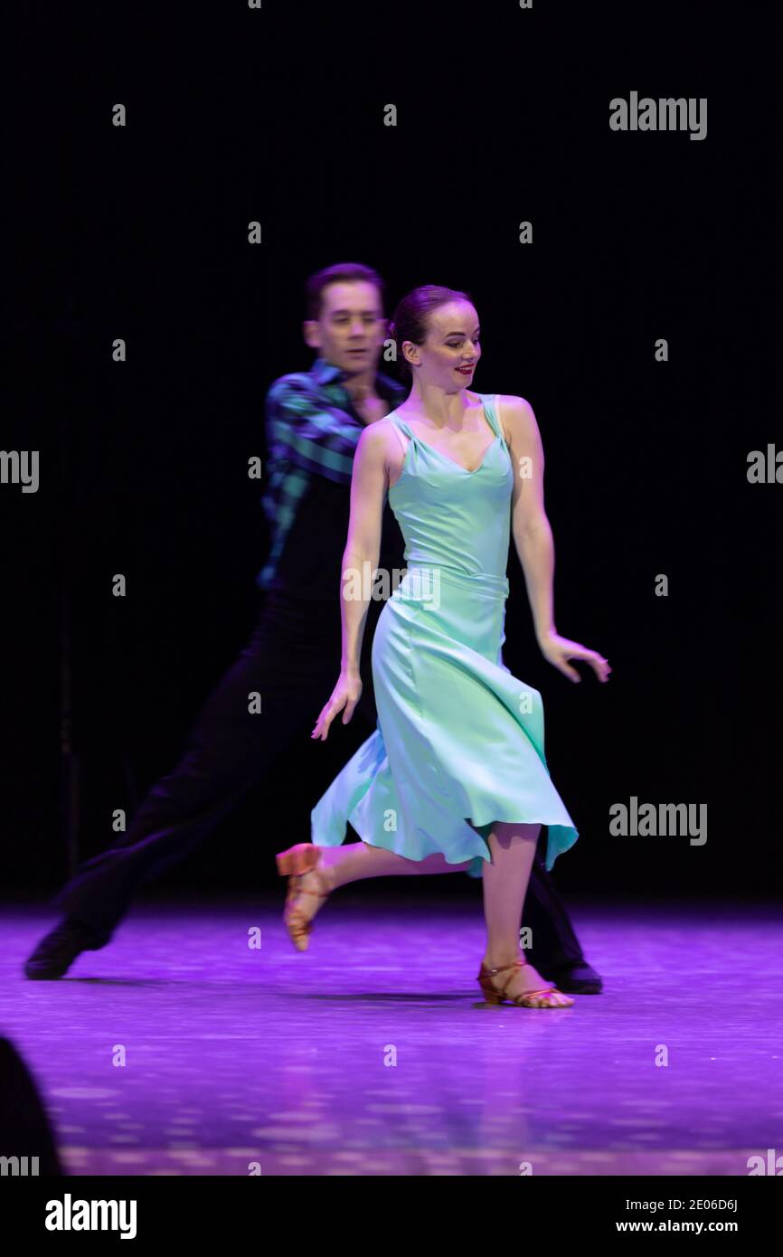 dancers a man and a woman perform in a theater on stage in a dance ...