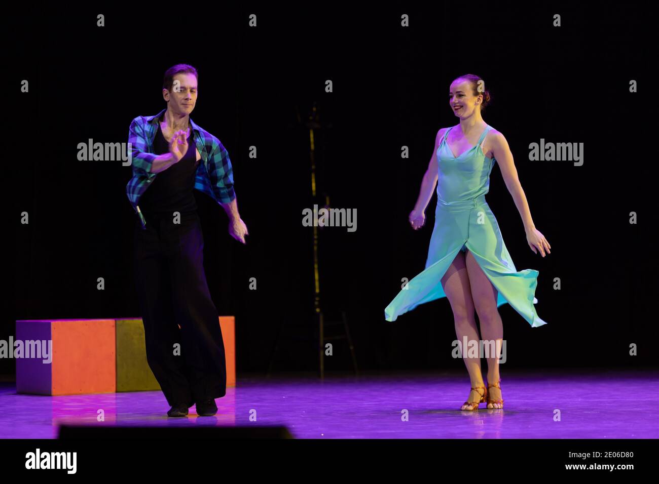 dancers a man and a woman perform in a theater on stage in a dance ...