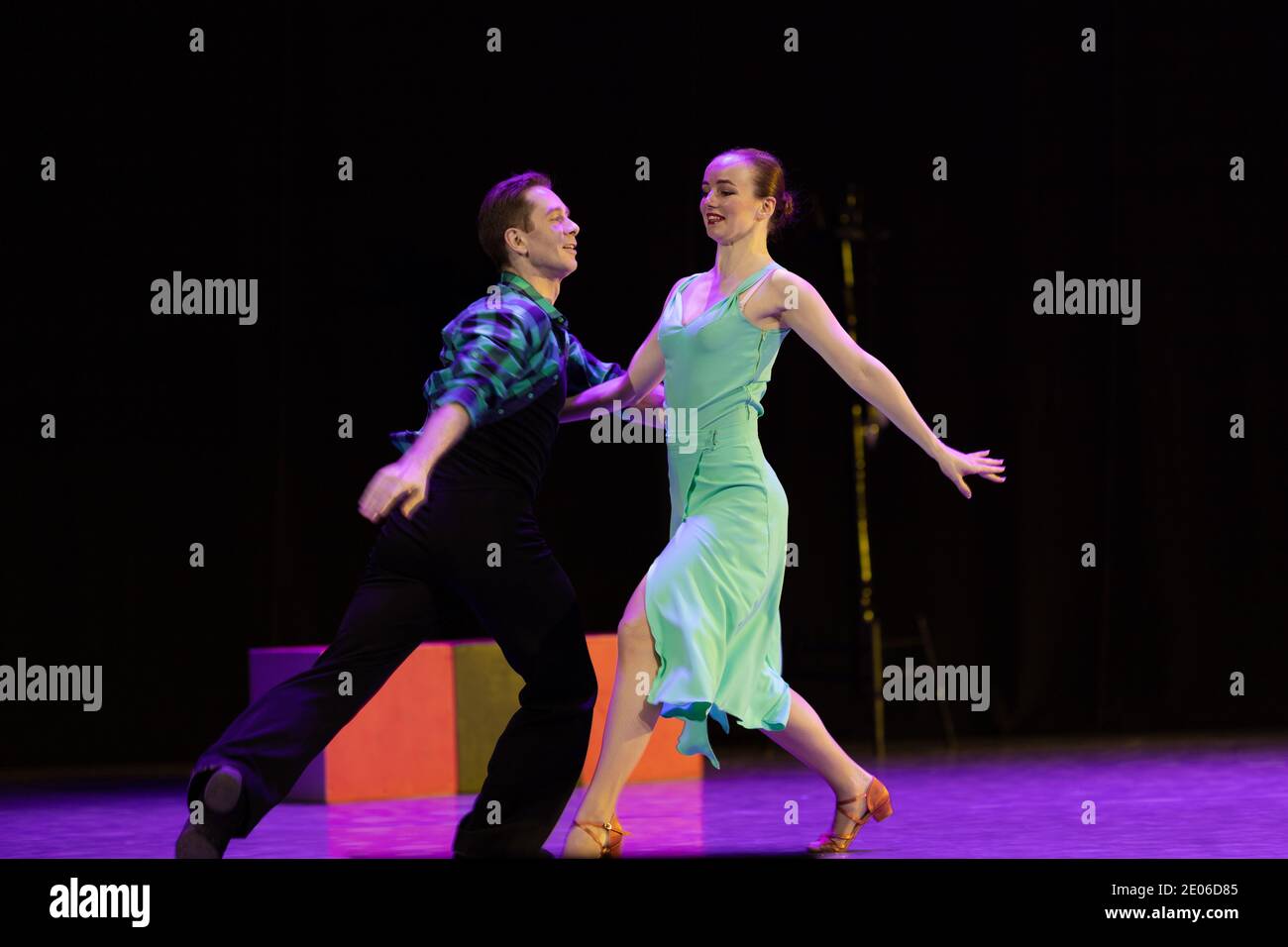 dancers a man and a woman perform in a theater on stage in a dance ...