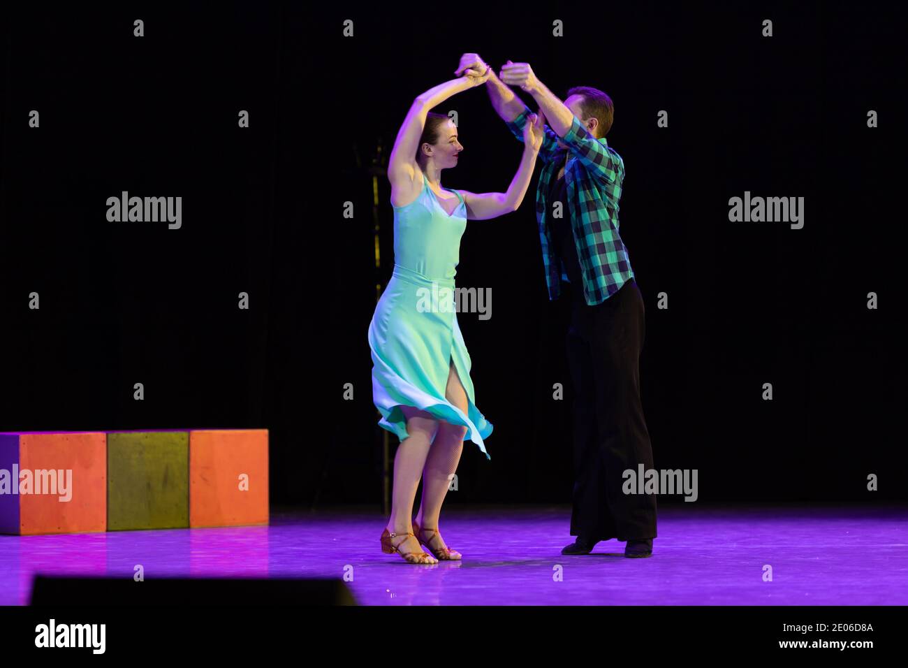 dancers a man and a woman perform in a theater on stage in a dance ...