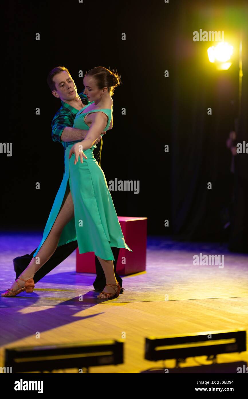 dancers a man and a woman perform in a theater on stage in a dance ...