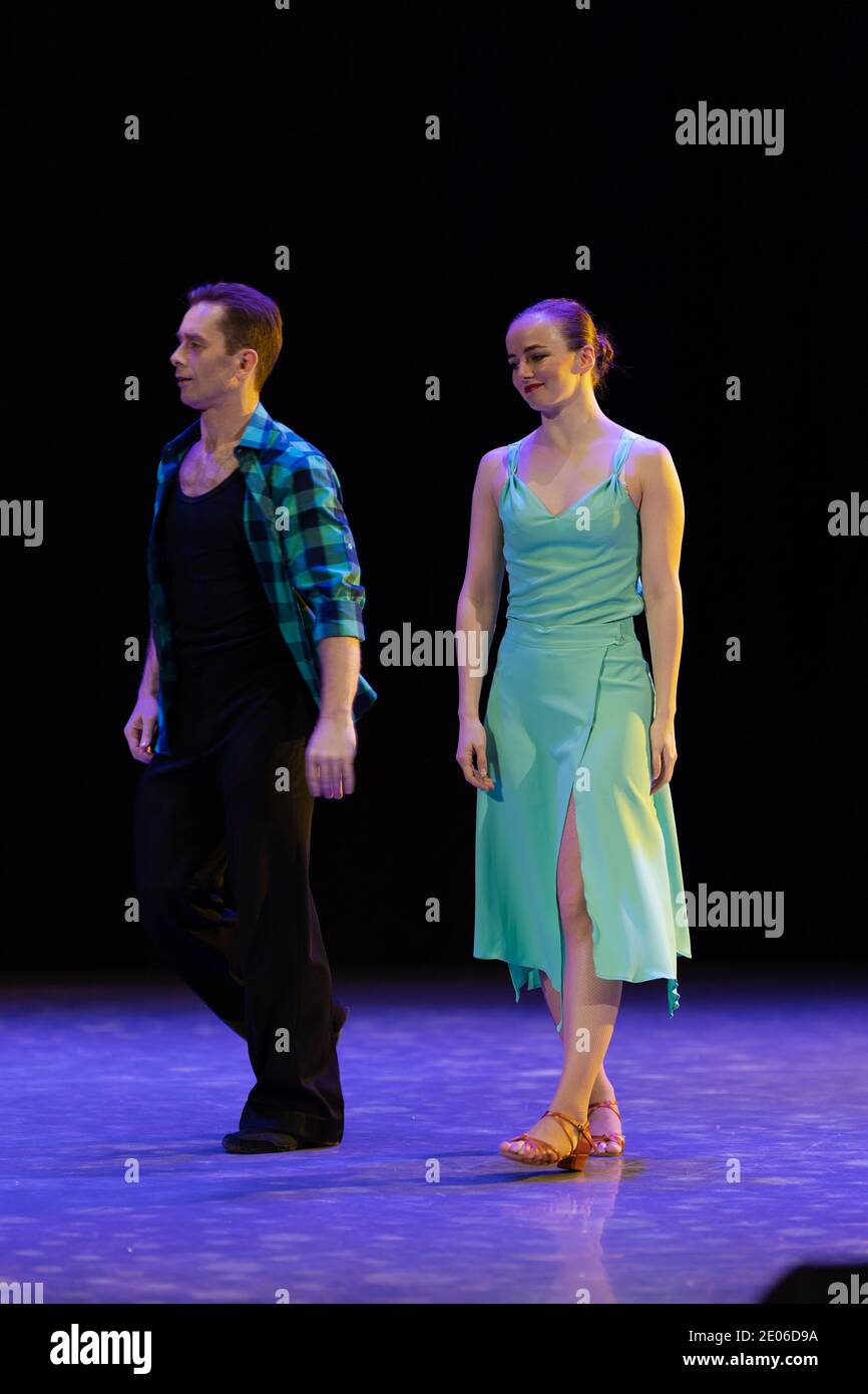 dancers a man and a woman perform in a theater on stage in a dance ...