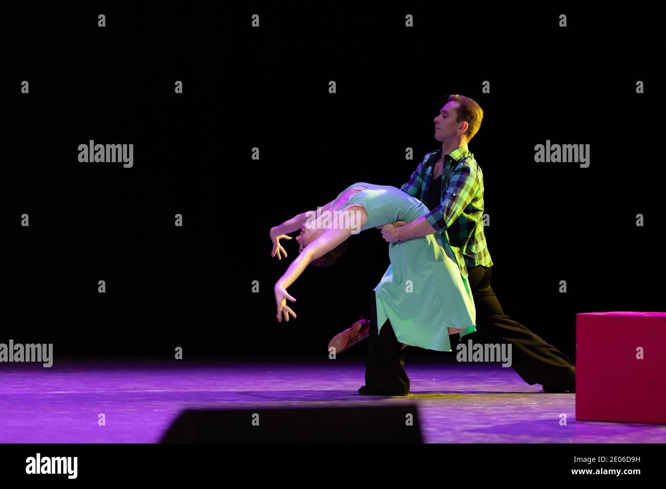 dancers a man and a woman perform in a theater on stage in a dance ...