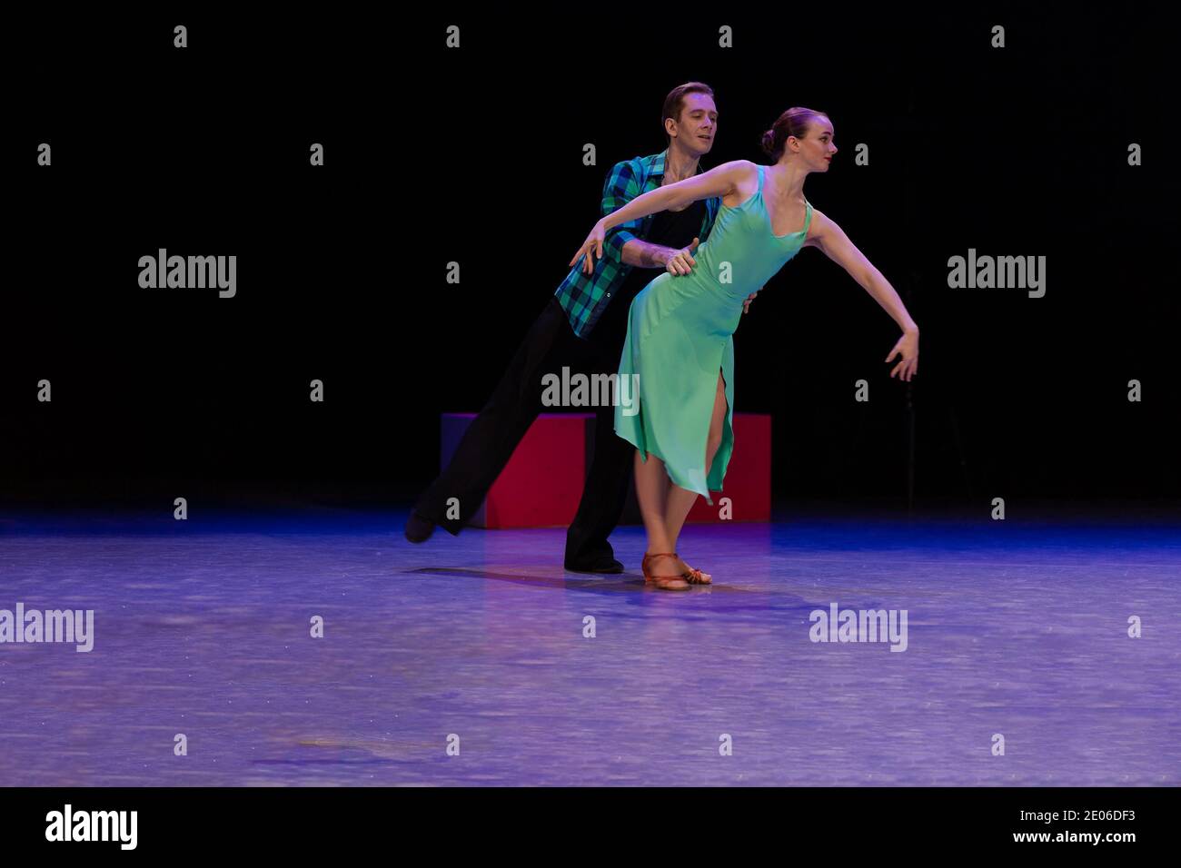 dancers a man and a woman perform in a theater on stage in a dance ...