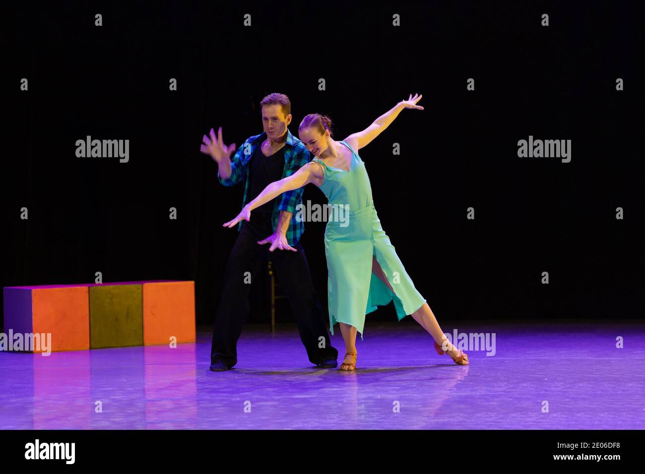 dancers a man and a woman perform in a theater on stage in a dance ...
