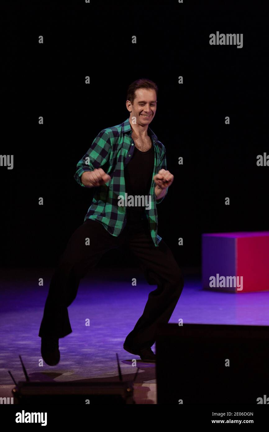 Actor dancer young man performs in the theater on stage in a dance ...