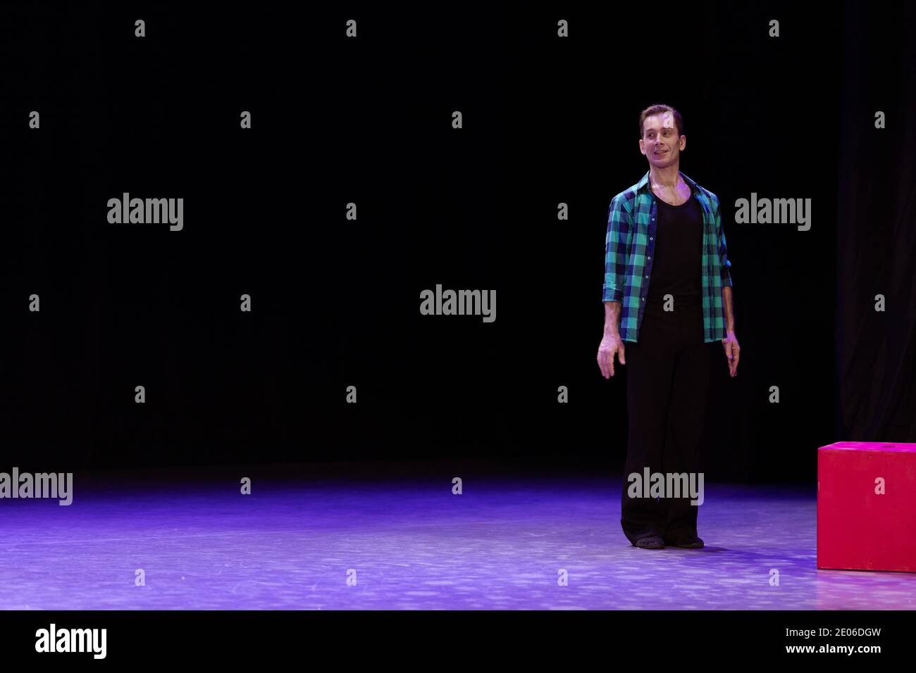 Actor dancer young man performs in the theater on stage in a dance ...