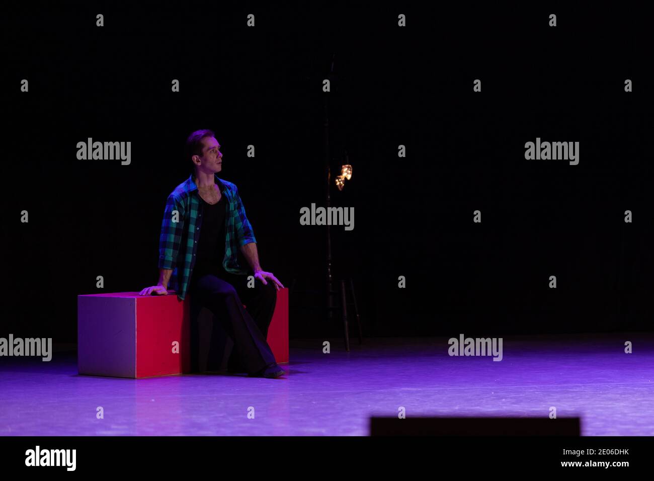 Actor dancer young man performs in the theater on stage in a dance ...