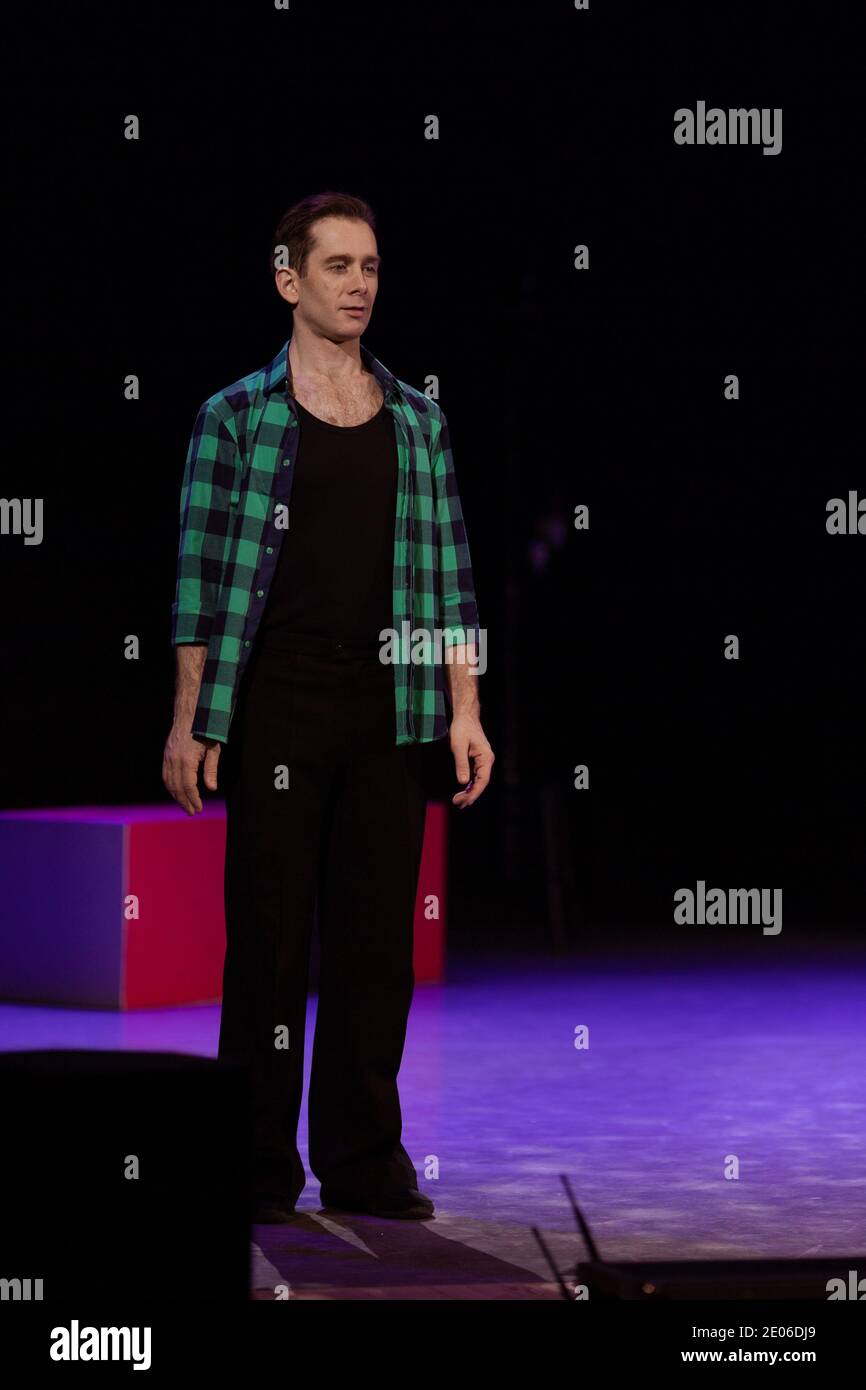 Actor dancer young man performs in the theater on stage in a dance ...