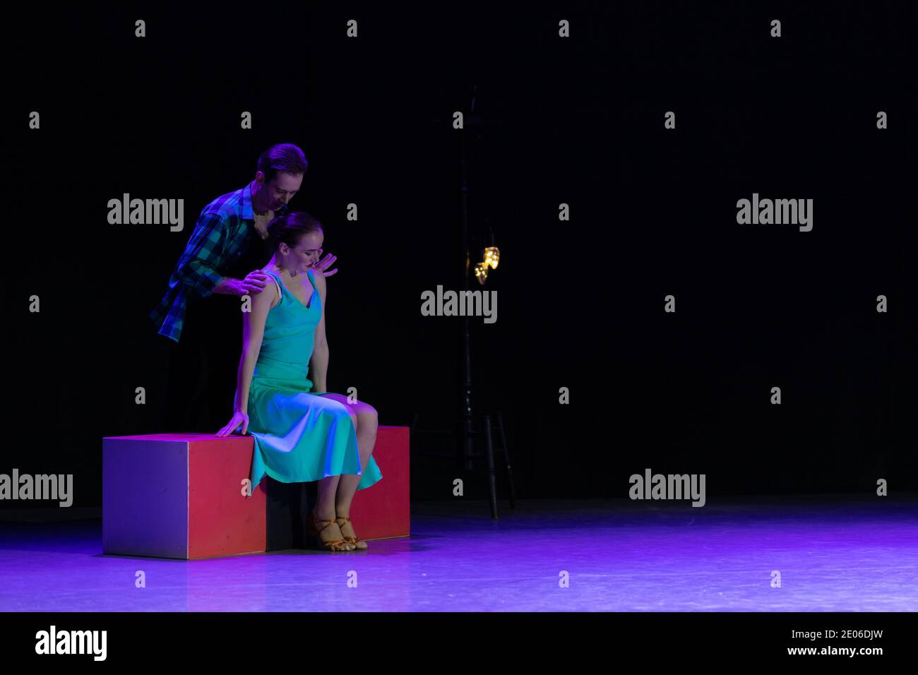 dancers a man and a woman perform in a theater on stage in a dance ...